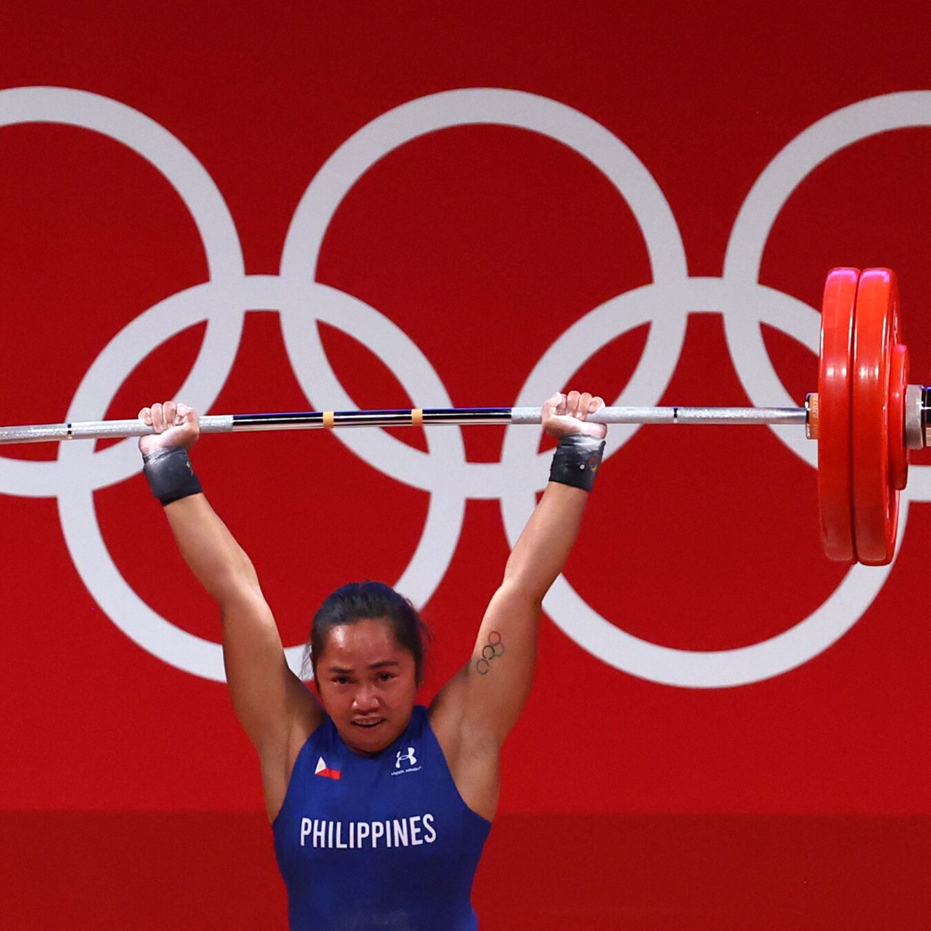 Weightlifter Hidilyn Diaz takes home PH’s first ever Olympic gold medal ...